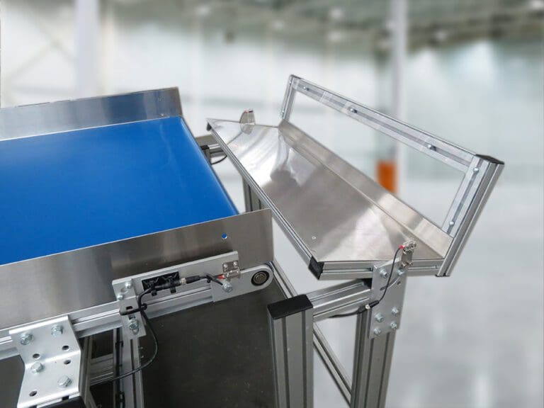 Belt Conveyor System with Airlock Chamber for Medical Packaging Operation