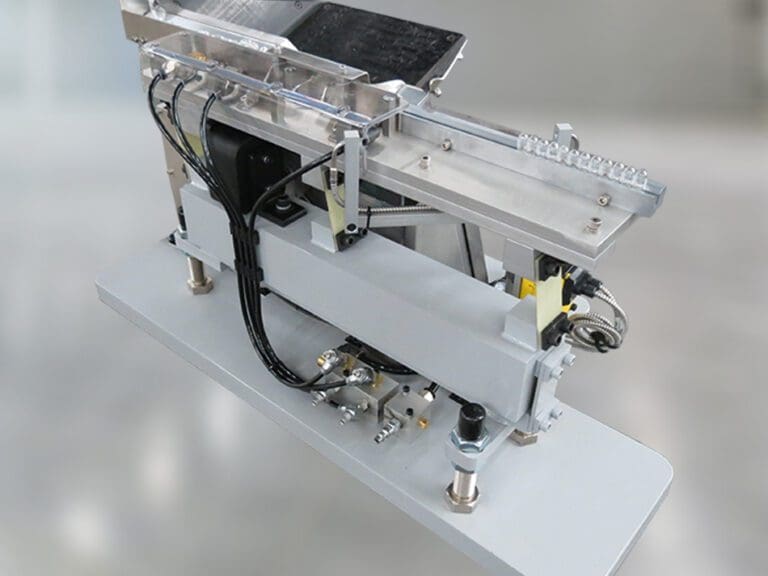 Step Feeder Gently Handles, Orients and Feeds Glass Light Bulb